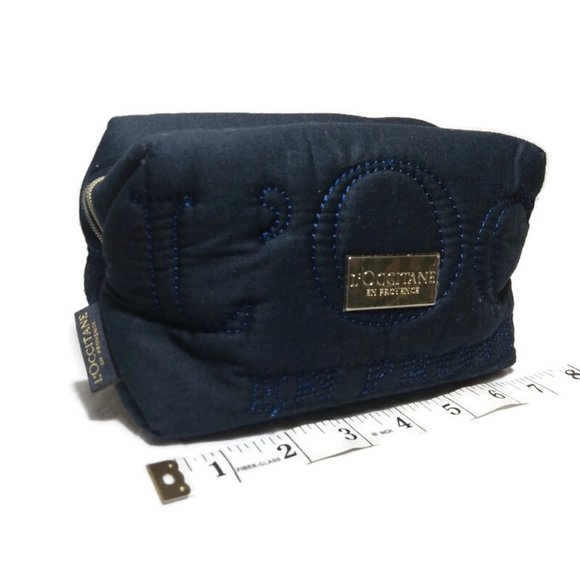 L'OCCITANE | Bags | Loccitane Navy Blue Quilted Lined Logo Zip Jewelry ...